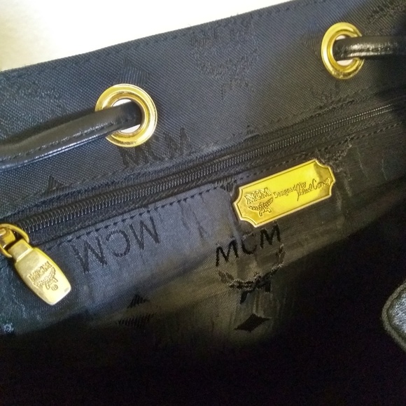 MCM | Bags | Mcm Black Signature Leather Trim Backpack | Poshmark